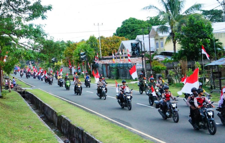Kobarkan Semangat Kemerdekaan, Dandim 1708/BN Pimpin Pawai Bendera ...